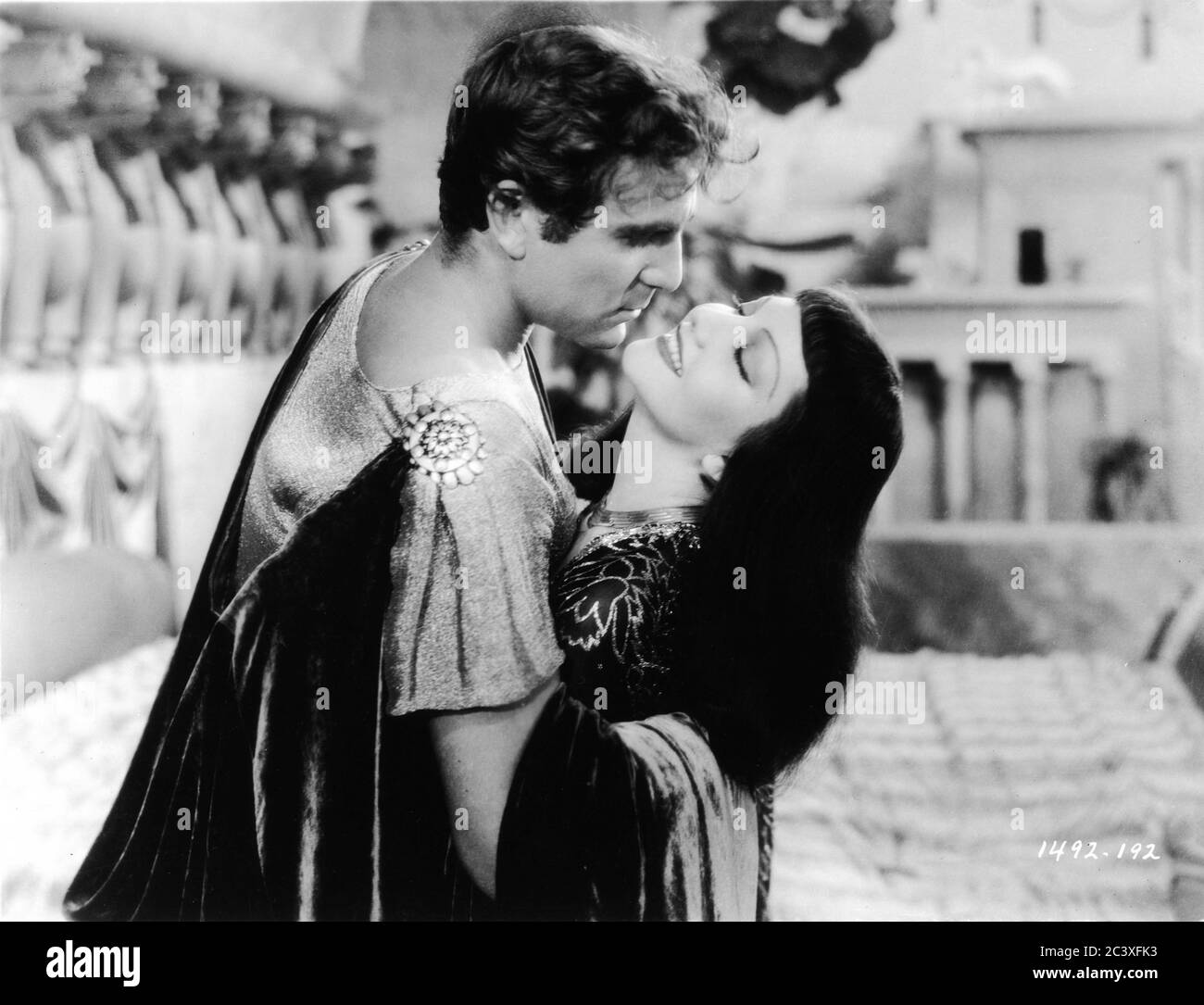 HENRY WILCOXON as Marc Antony and CLAUDETTE COLBERT as CLEOPATRA 1934 director CECIL B. DeMILLE ...