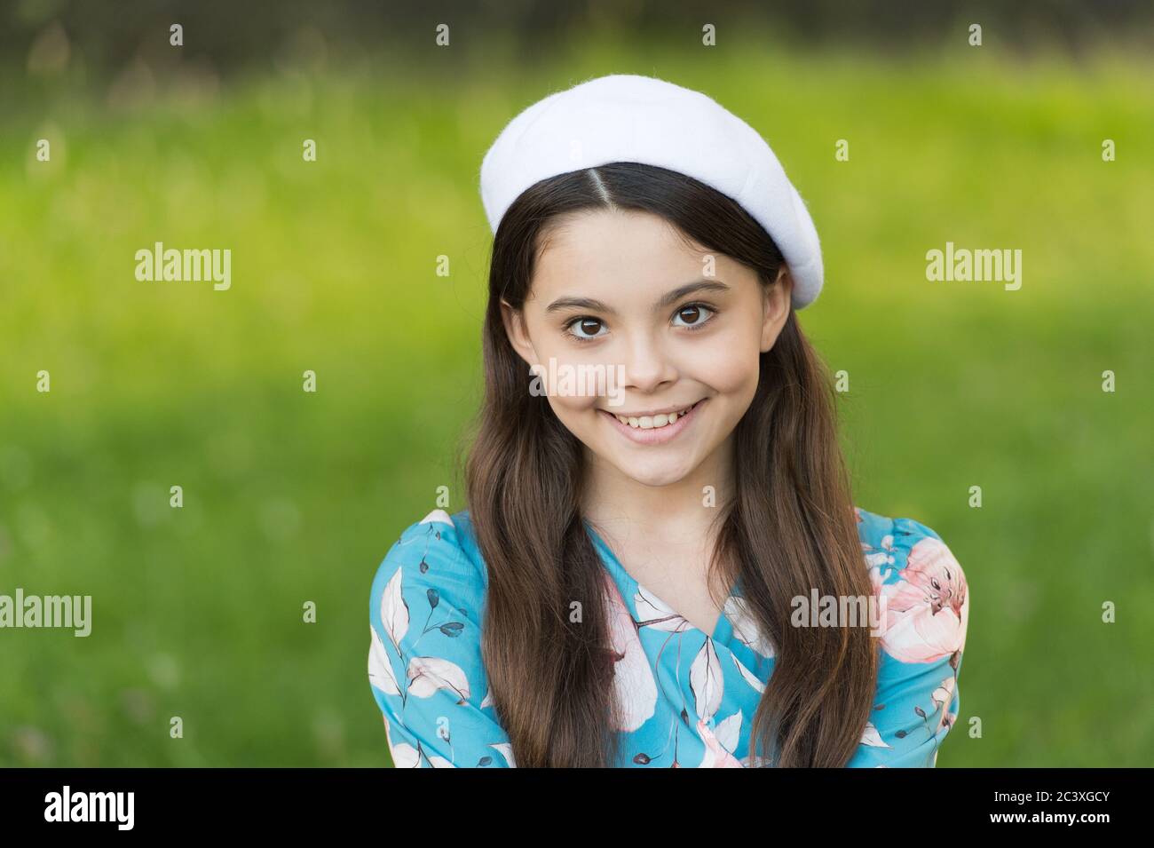 Grow up with smiling. Happy kid with cheerful smiling face outdoors ...