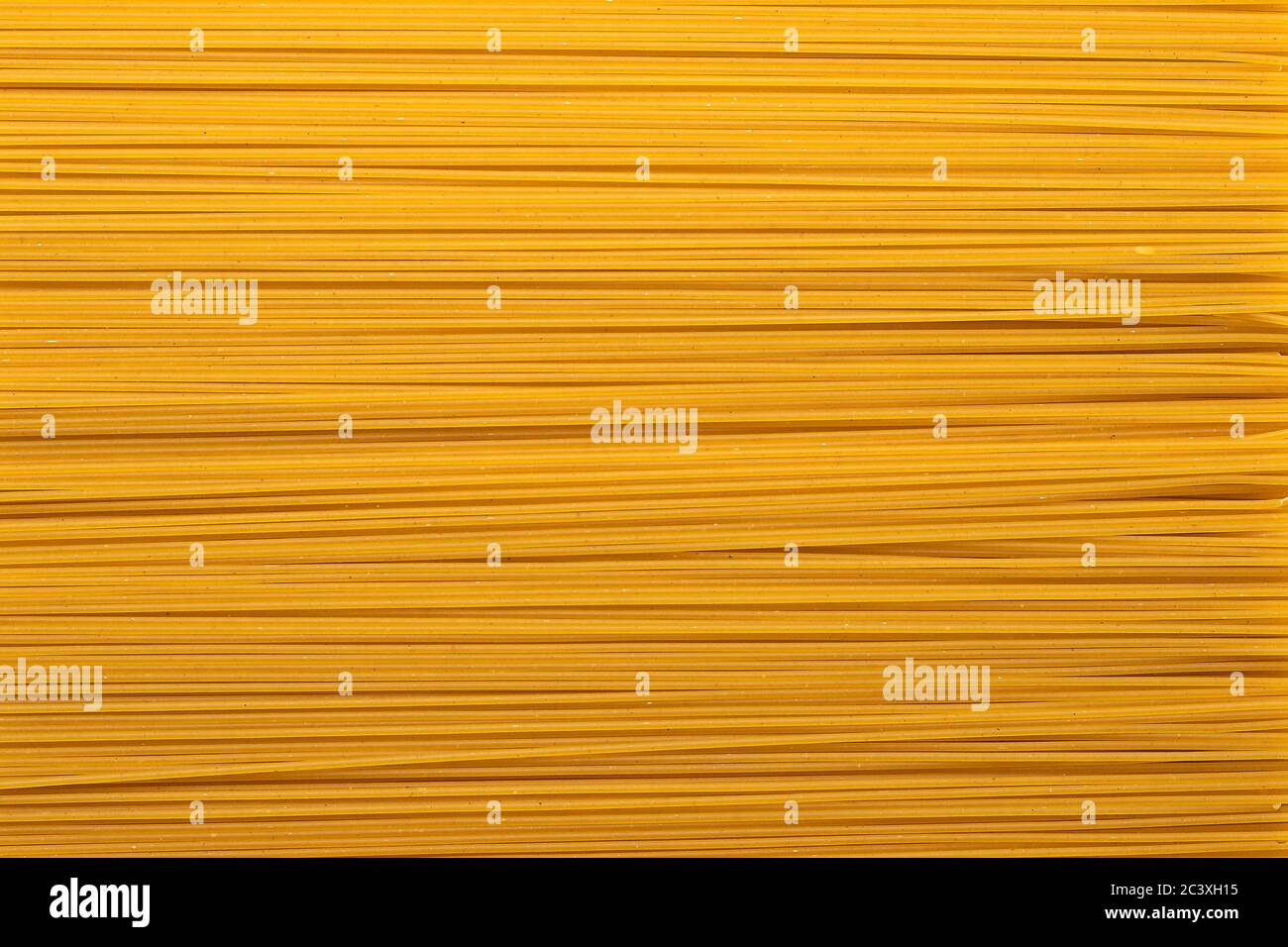 Scattered and uncooked spaghetti texture. Pastry pattern, food ...