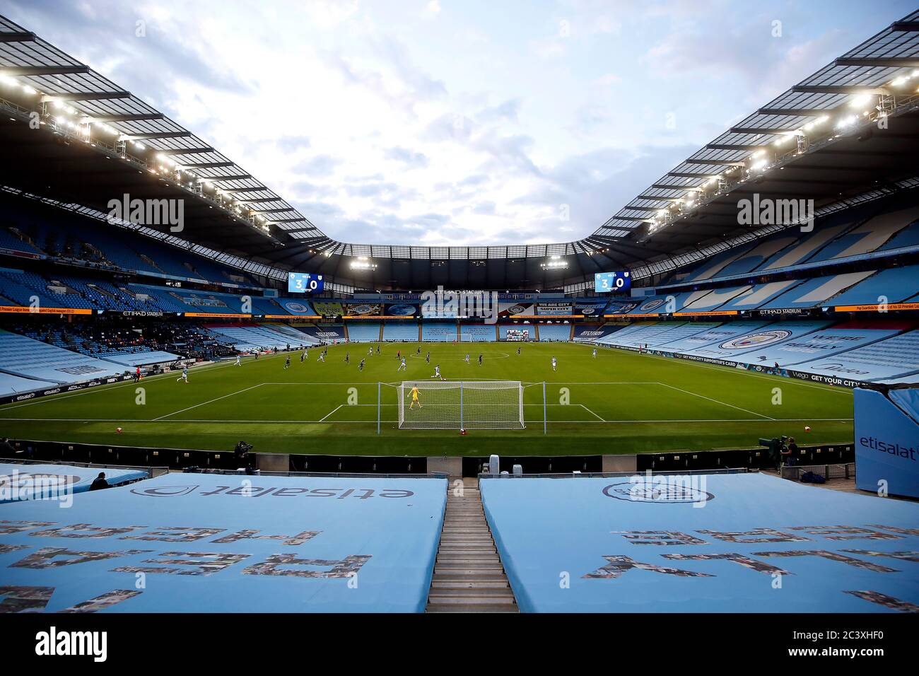 General view of the action on the pitch in front of empty stands in the ...