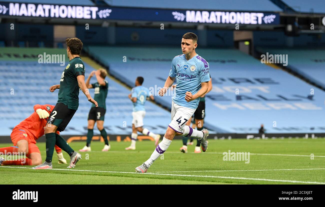 Manchester City's Phil Foden celebrates scoring his side's fifth goal ...