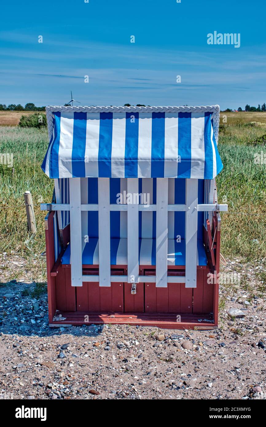 Traditional wooden beach chairs on Fehmarn island Stock Photo - Alamy