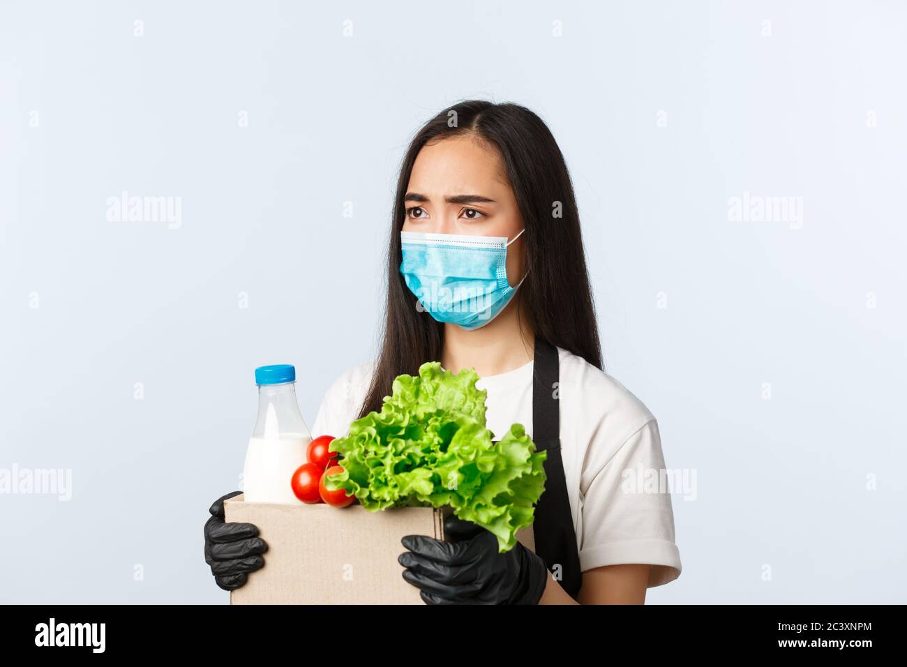 Grocery worker sad hi-res stock photography and images - Alamy