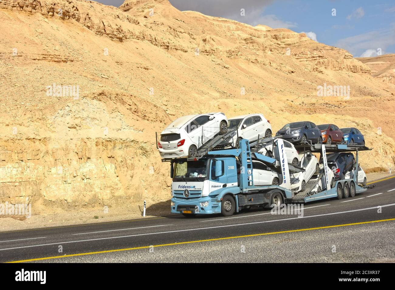 Transportation of new cars on a truck Stock Photo - Alamy