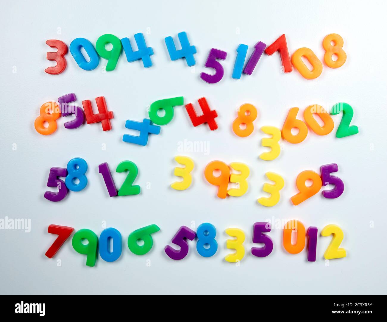 magnetic numbers on white background Stock Photo - Alamy