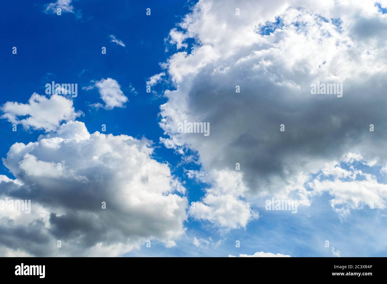 High contrast clouds with blue sky Stock Photo - Alamy