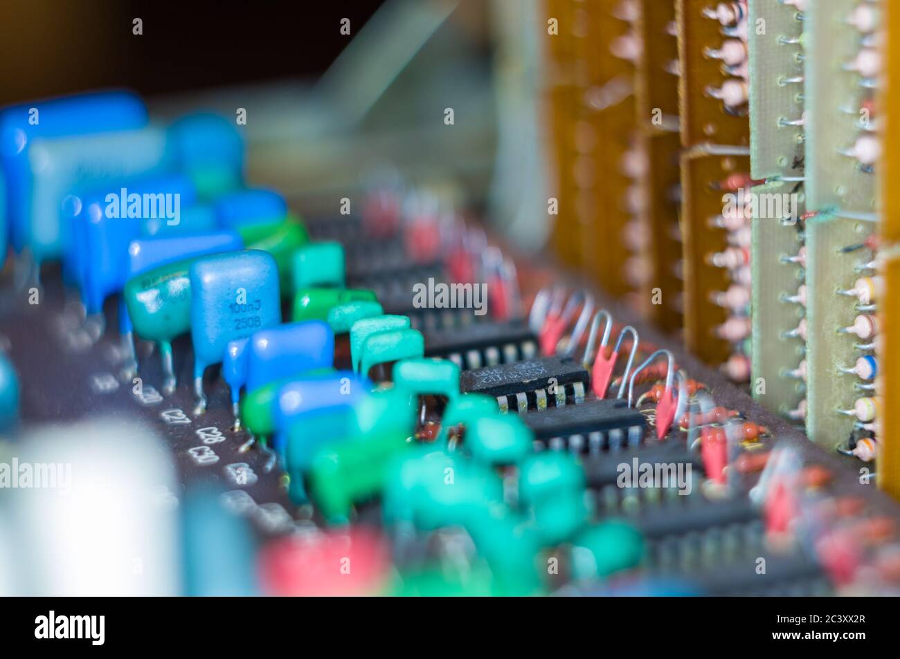 Vintage electronic circuit boards with radio parts and chips, close-up ...