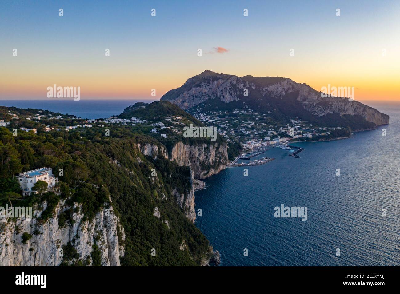 Aerial View of Villa Lysis / Fersen at sunset, the island of capri and ...