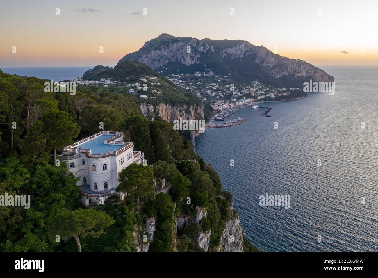 Aerial View of Villa Lysis / Fersen at sunset, the island of capri and ...