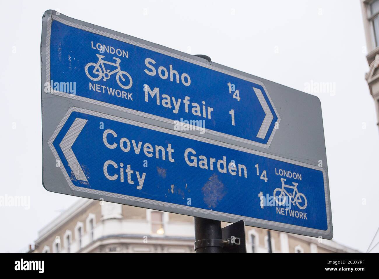 Road sign for Soho, Mayfair, Covent Garden and the City in London ...
