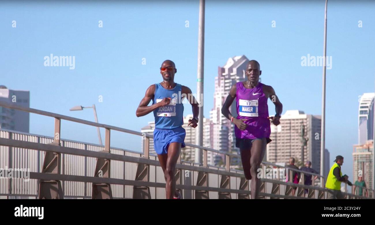 RUNNER, right: South Sudanese marathoner Guor Marial (aka Guor Mading ...