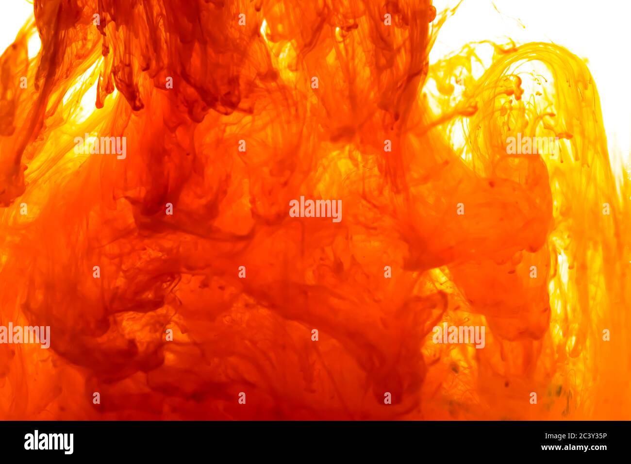 Orange watercolor ink in water hi-res stock photography and images - Alamy