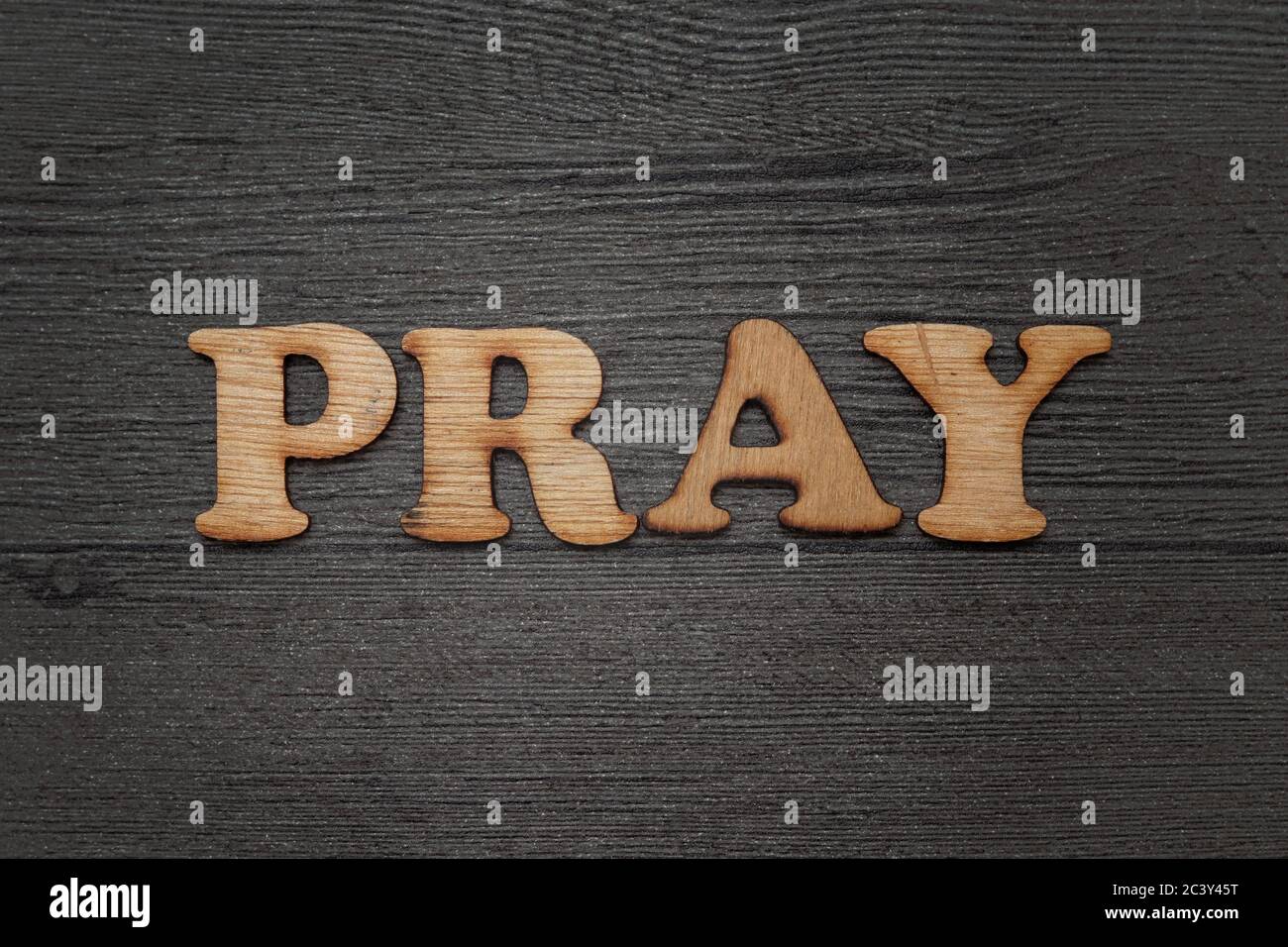 Pray words text, wooden alphabet lettering with grunge effect Stock ...