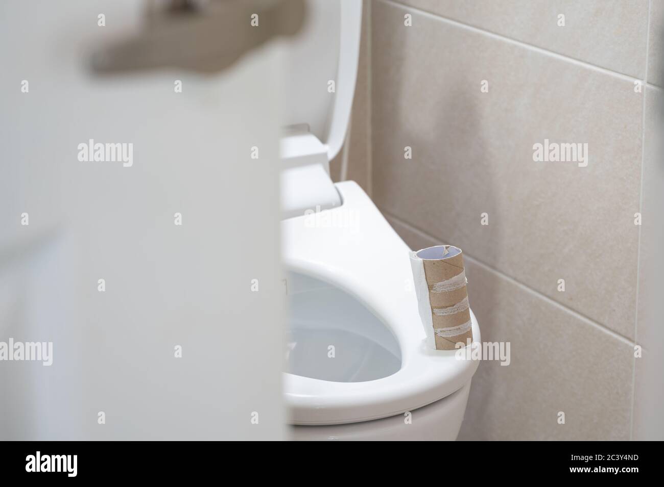 Running out of toilet paper in the bathroom Stock Photo - Alamy