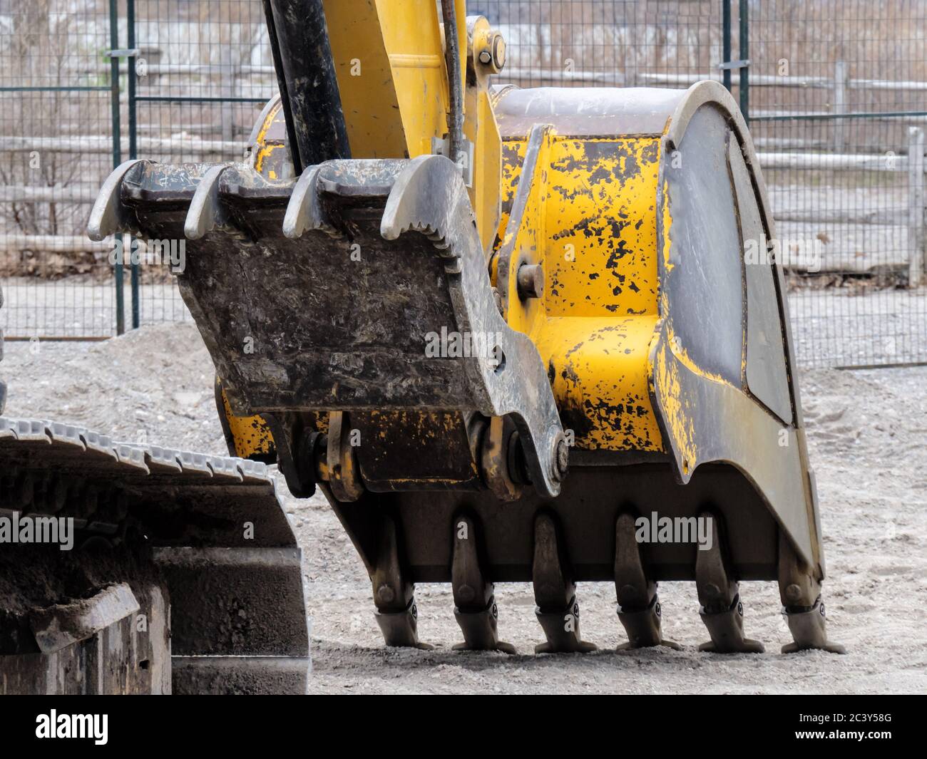 detail of a heavy steel excavator bucket from a construction digger ...