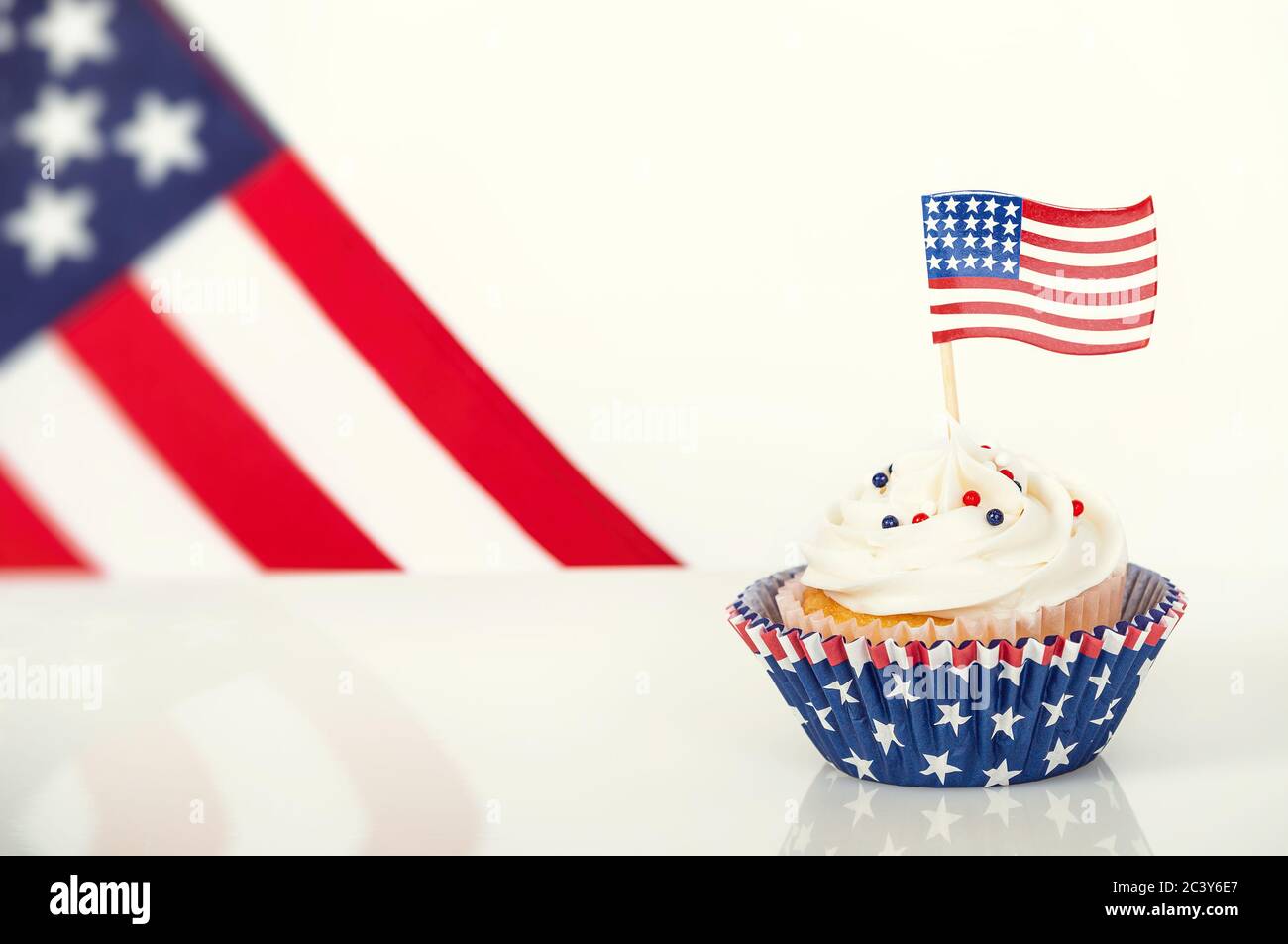 Patriotic 4th of July cupcake with American flag Stock Photo - Alamy