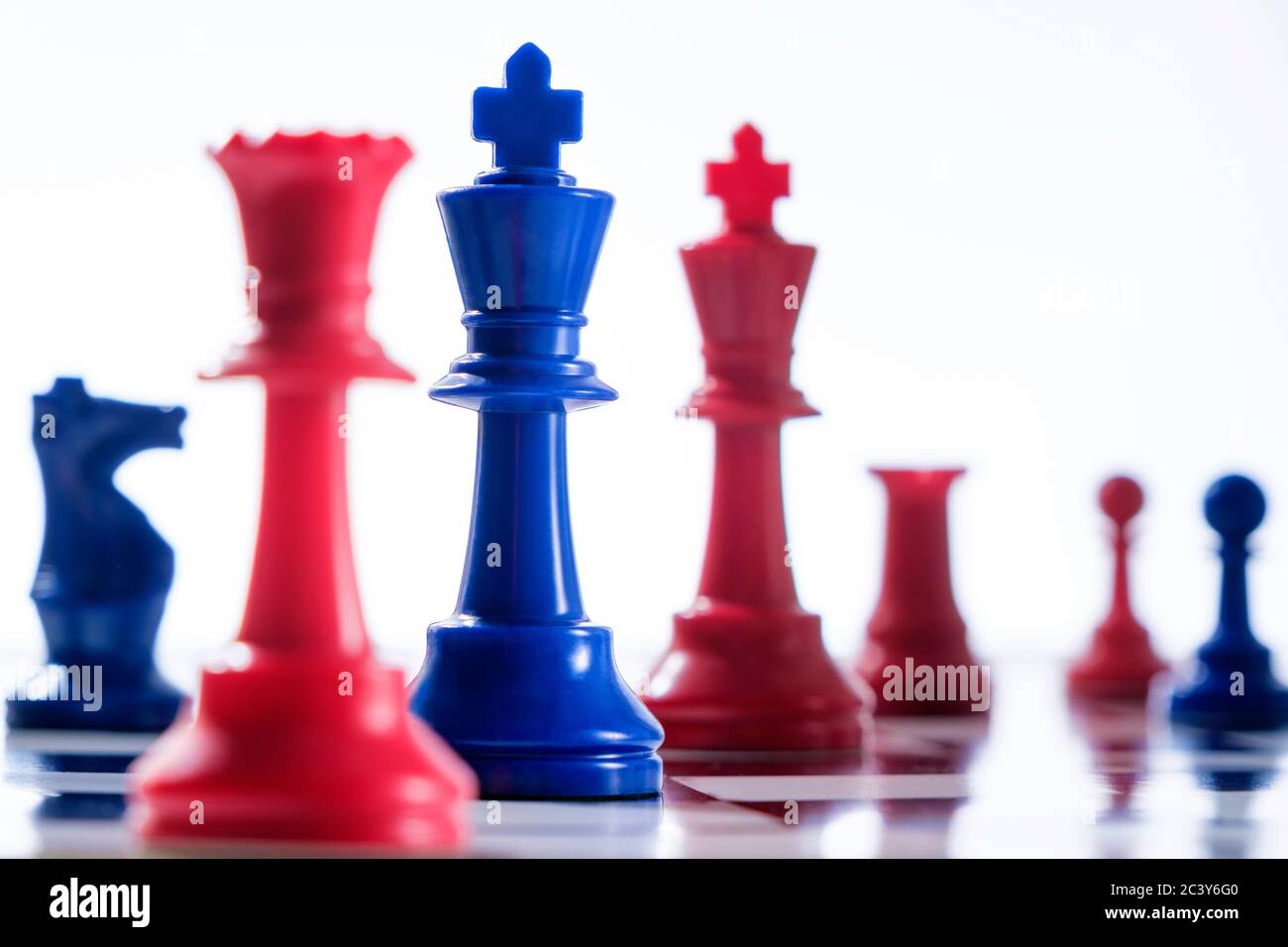 Studio shot of red and blue chess pawns symbolizing US Democratic and ...