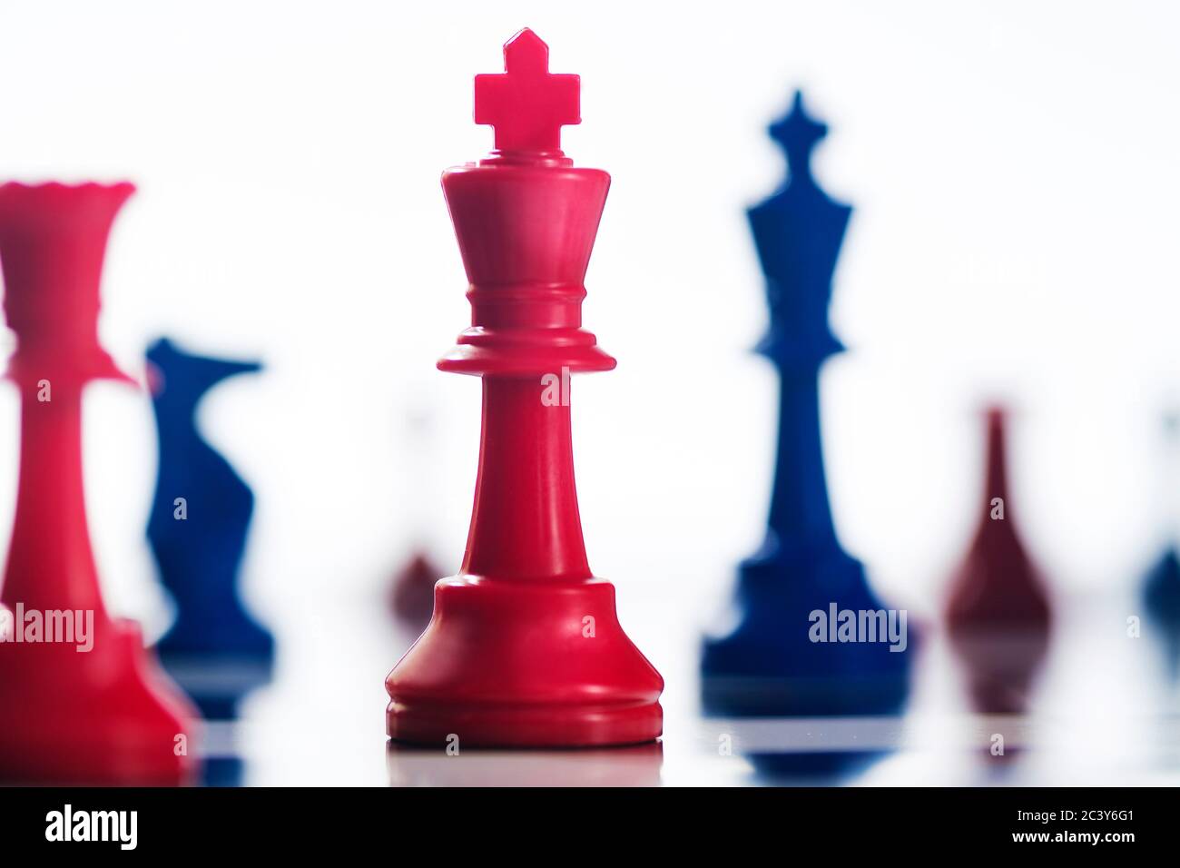 Studio shot of red and blue chess pawns symbolizing US Democratic and ...