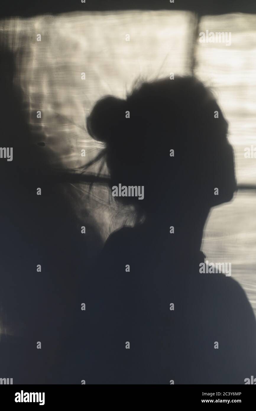 Sunlight shadow woman hi-res stock photography and images - Alamy
