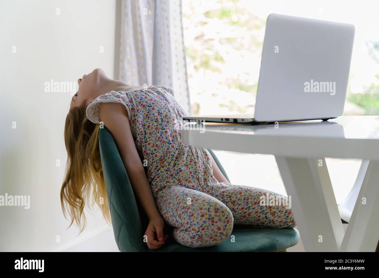 Person leaning back on chair hi-res stock photography and images - Alamy