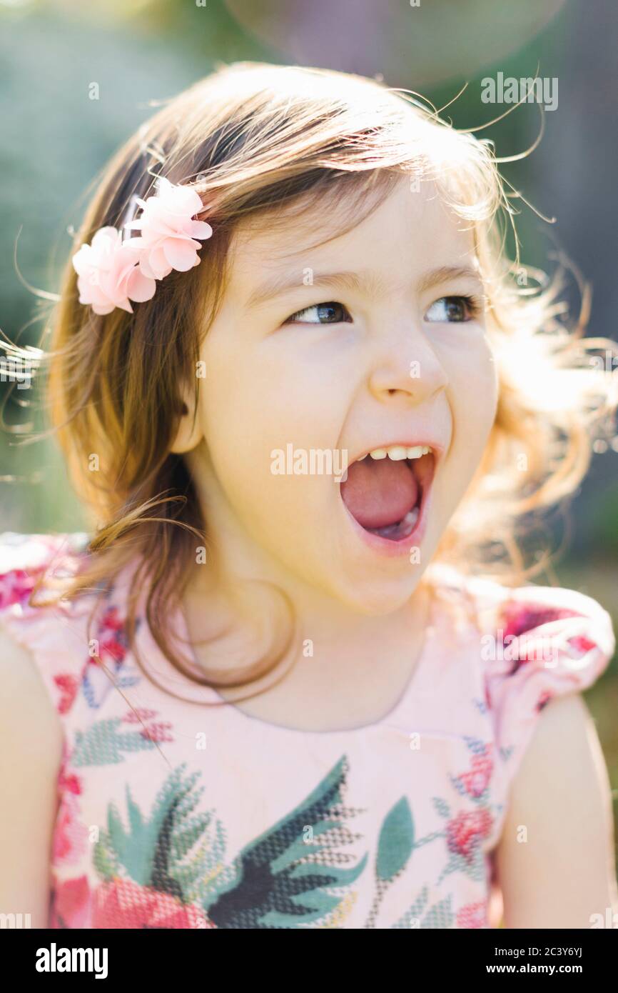 Portrait of girl laughing Stock Photo - Alamy
