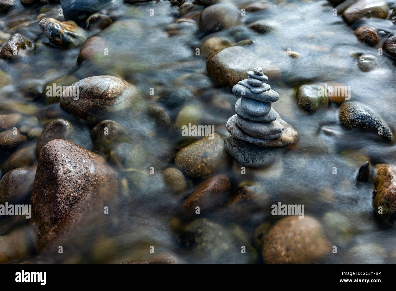 USA, Idaho, Sun Valley, Rock stack among river rocks Stock Photo - Alamy