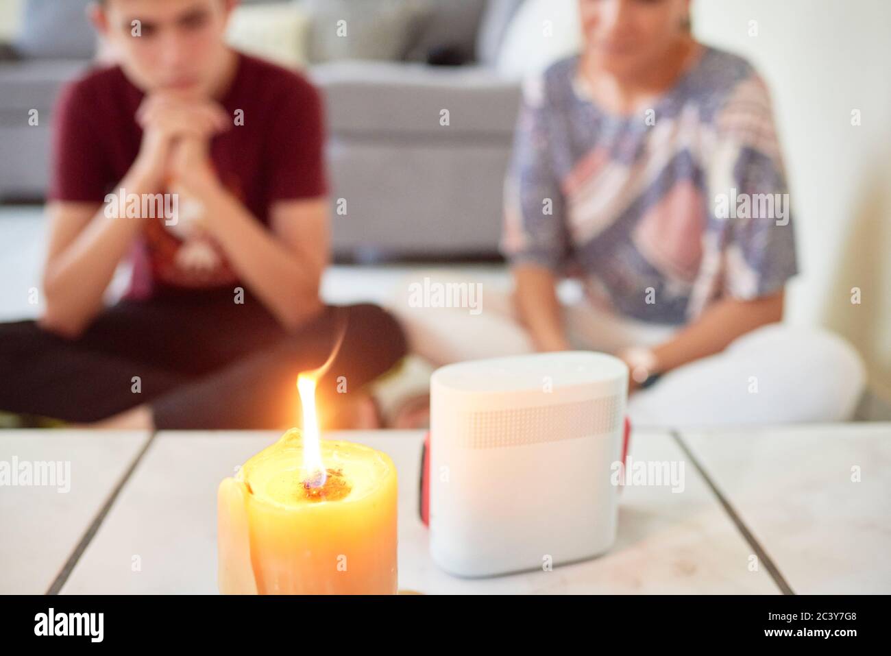 Family attending mass on cellphone Stock Photo - Alamy