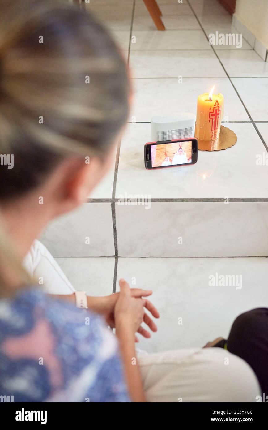 Watching mass hi-res stock photography and images - Alamy