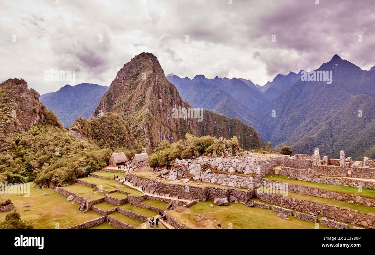 Peru, Machu Pichu, Mountain range and ruins of aztec village Stock ...