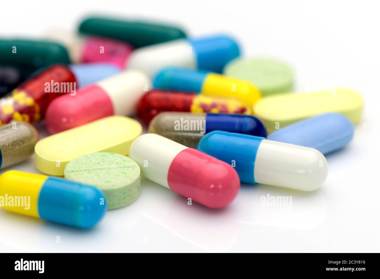 Oral medication background with warm light.Colorful of oral medications ...