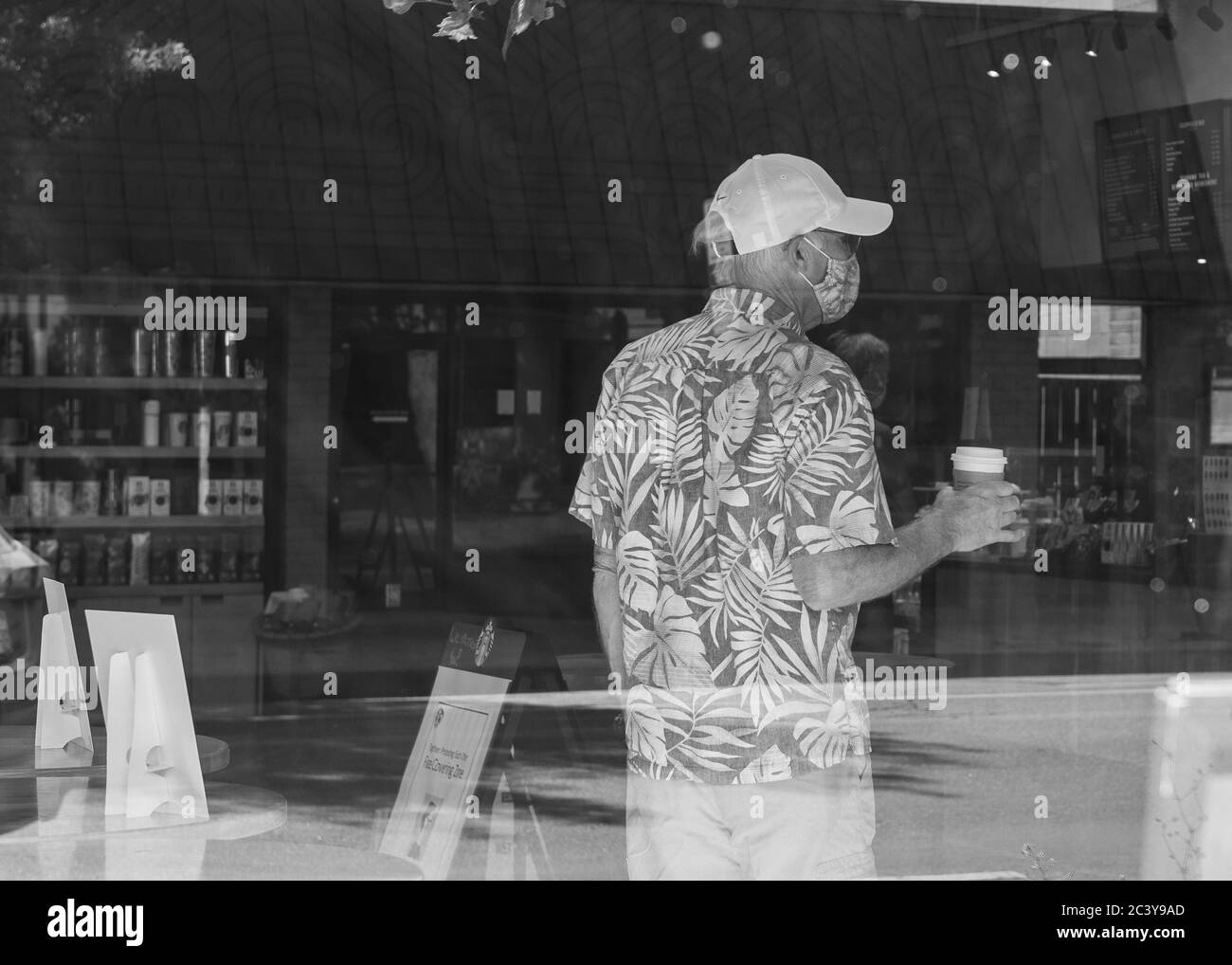 Holds coffee Black and White Stock Photos & Images - Alamy
