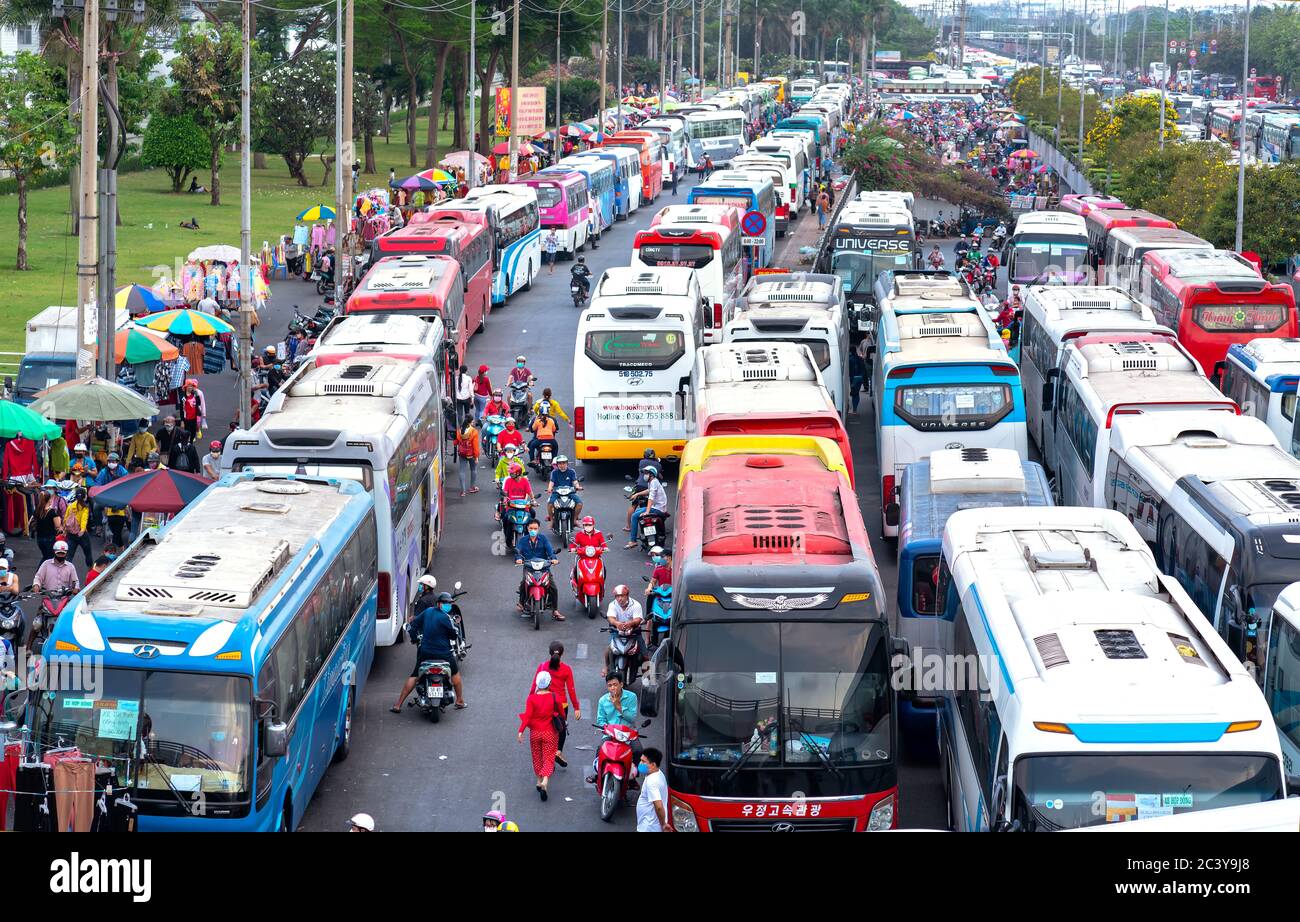 Busy cars line up wait for workers to get off work after a working day ...