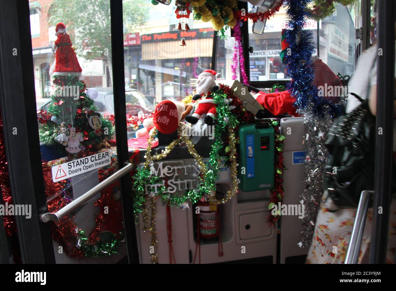 A lady boards a Sydney bus to find the bus driver dressed as Santa ...
