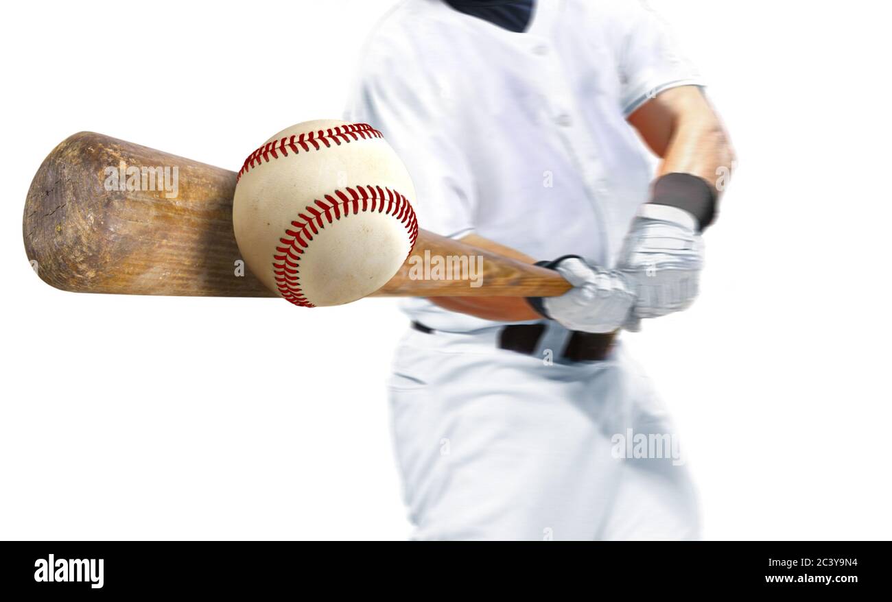 Baseball player hitting ball with bat over white background Stock Photo ...