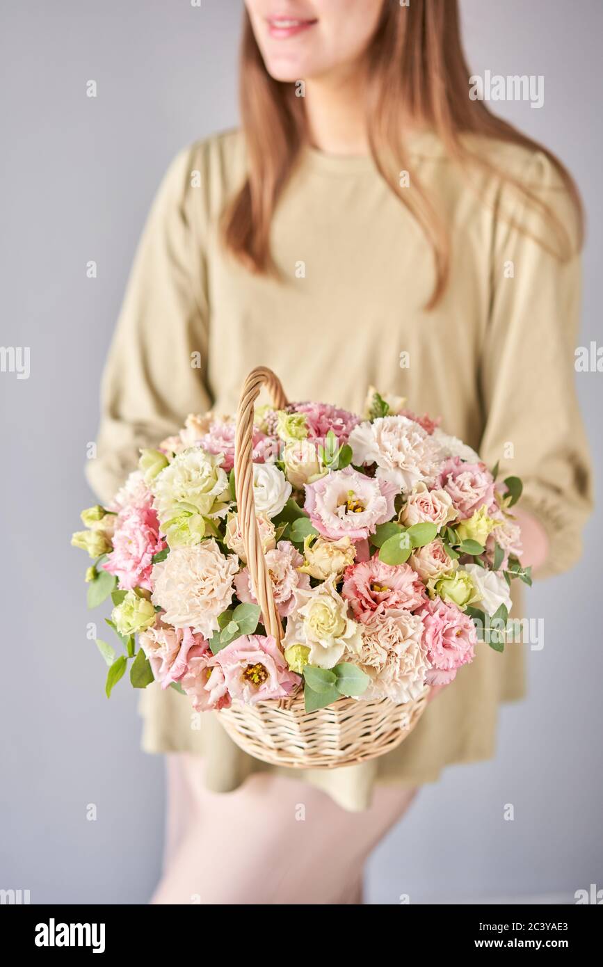 Small flower shop and Flowers delivery. Flower arrangement in Wicker ...