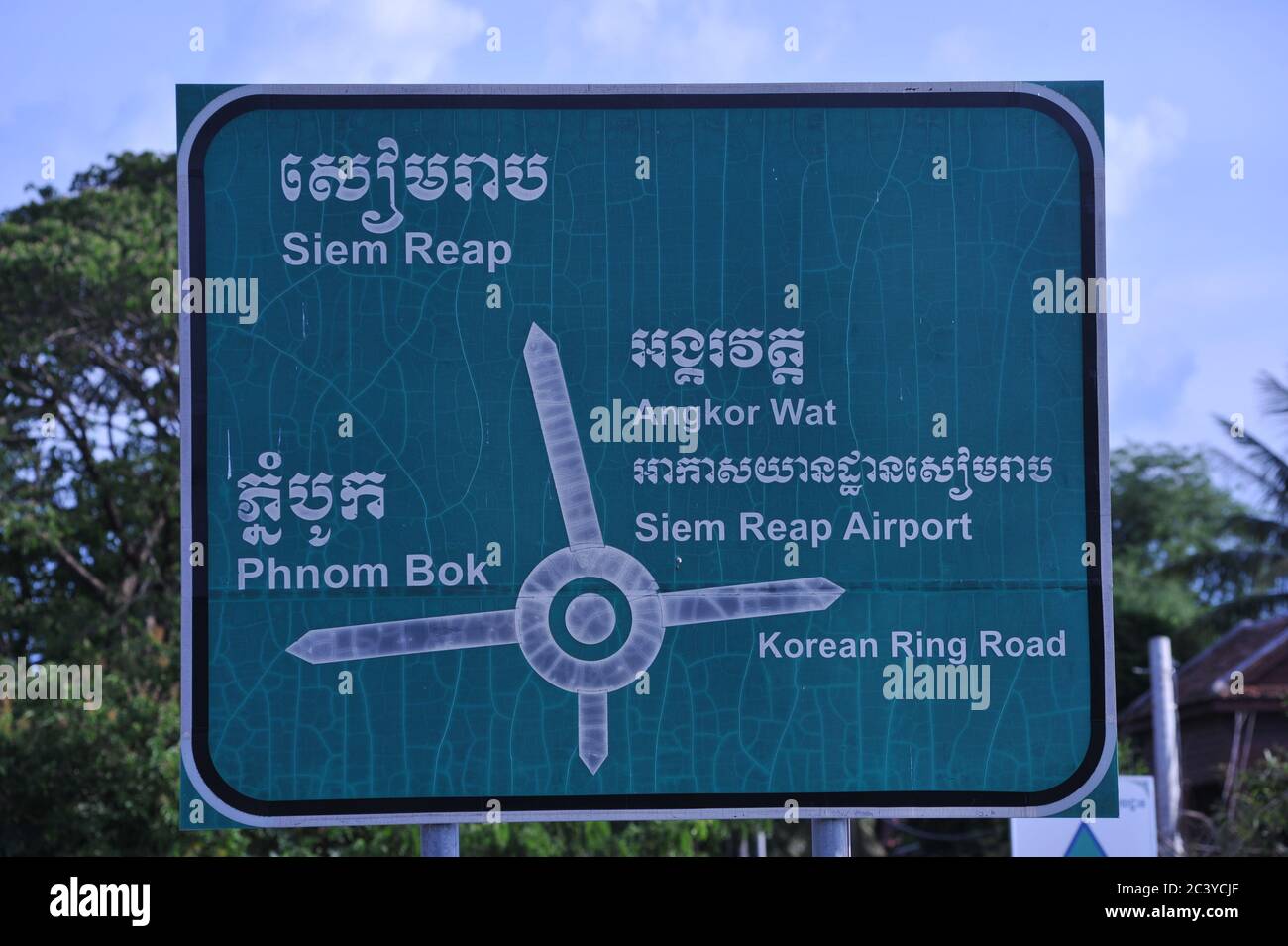 Bilingual directional road sign to Siem Reap, Angkor Wat & Siem Reap ...