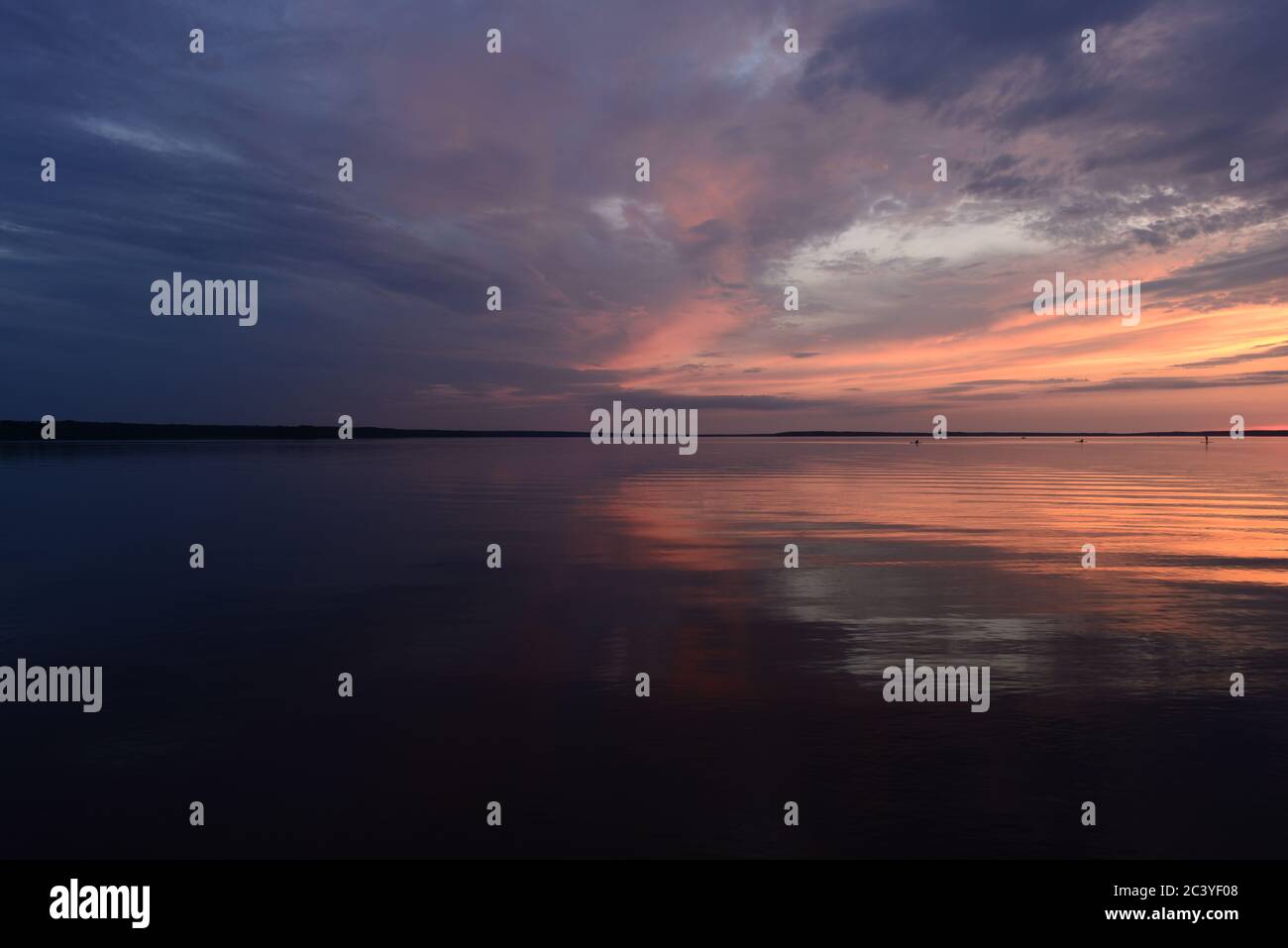 Twilight glow of the sky nightfall on a lake Stock Photo - Alamy