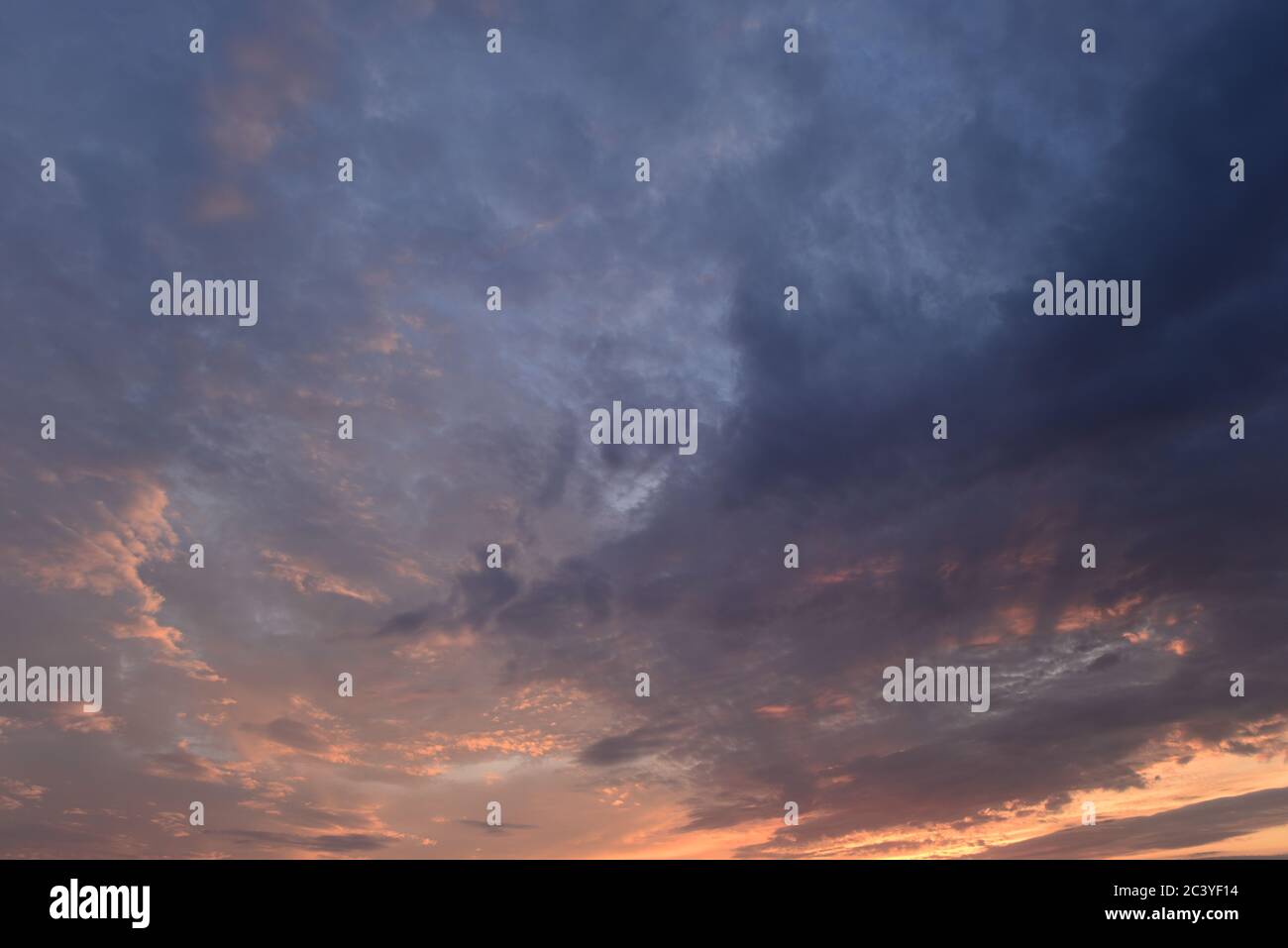 Saturated colors of the atmospheric sky at sunset in the summer dusk ...