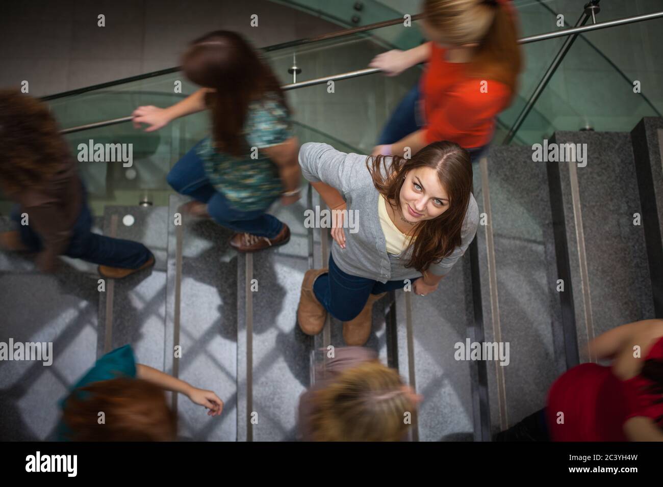 At the university/college - Students rushing up and down a busy ...