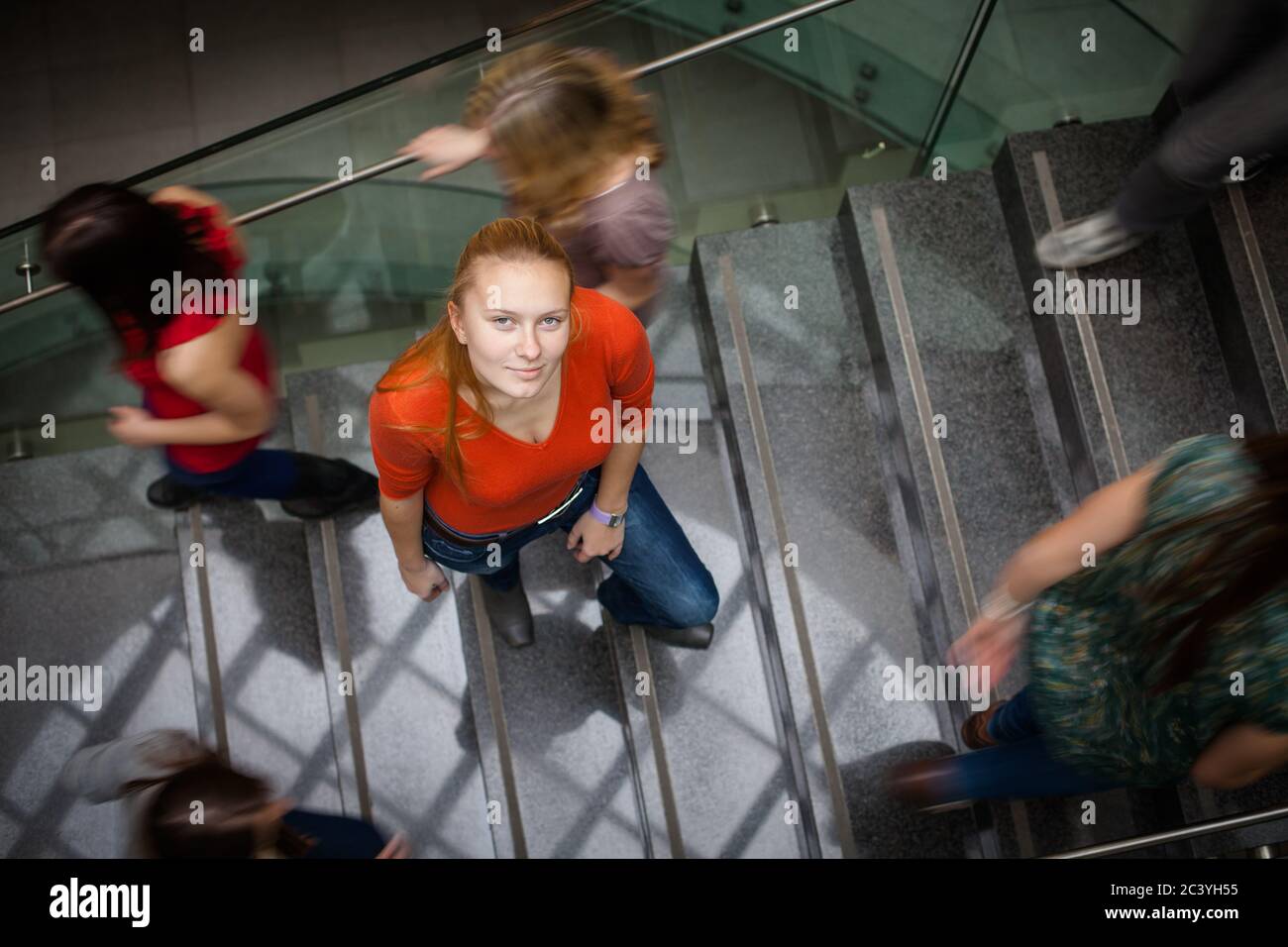 At the university/college - Students rushing up and down a busy ...