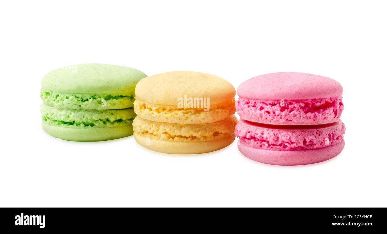 Different types of colourful french macaroons isolated on a white ...