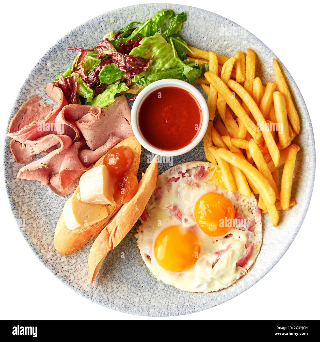 Full English Breakfast including ham, egg with bacon, french fries ...