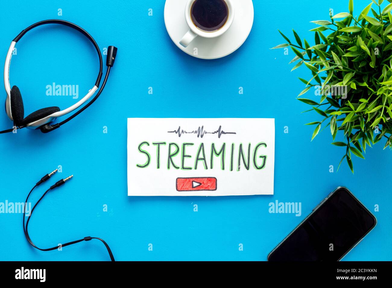 Online streaming social media concept. Paper tablet on office desk top ...