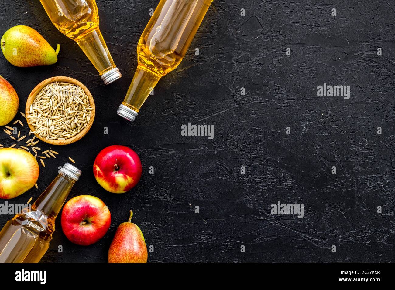Apple and pear cider on black background top view copy space Stock ...
