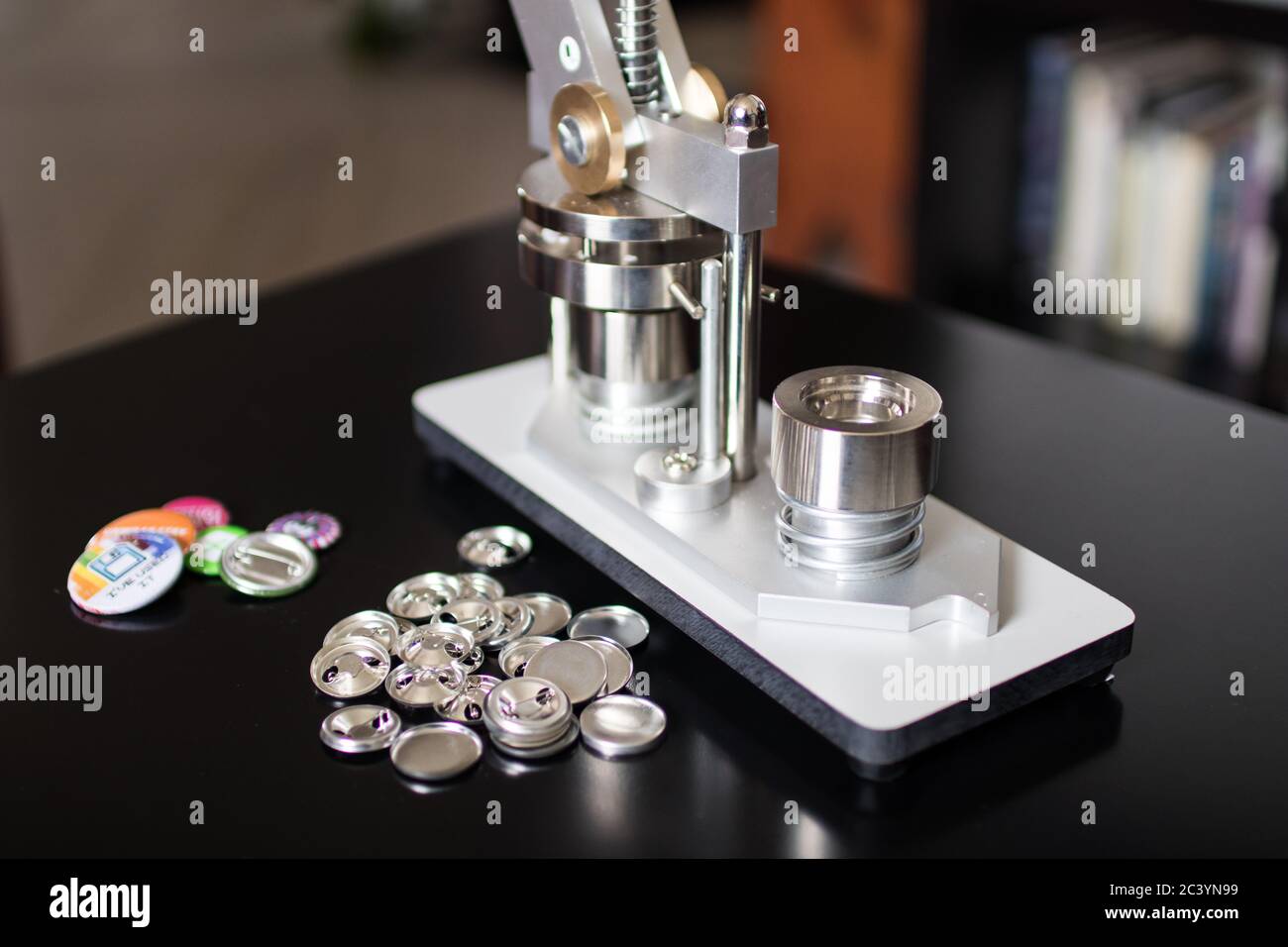 Button maker hi-res stock photography and images - Alamy