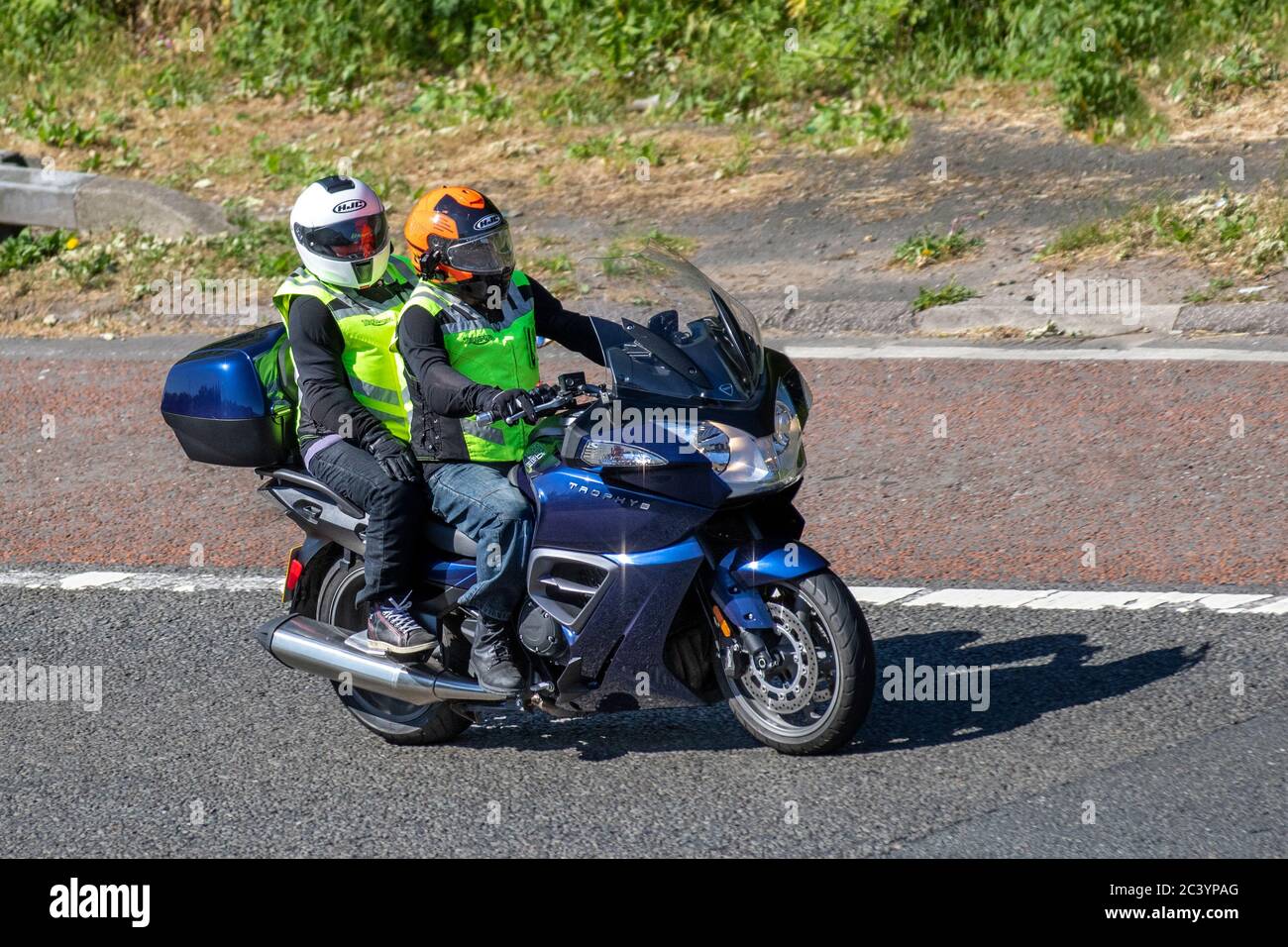 Blue TRIUMPH TROPHY BLUE Motorbike rider; two wheeled transport ...