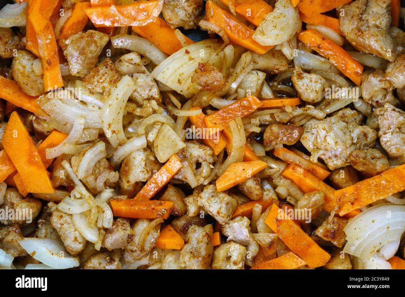 process of preparing a traditional dish of Eastern cuisine pilaf. meat ...