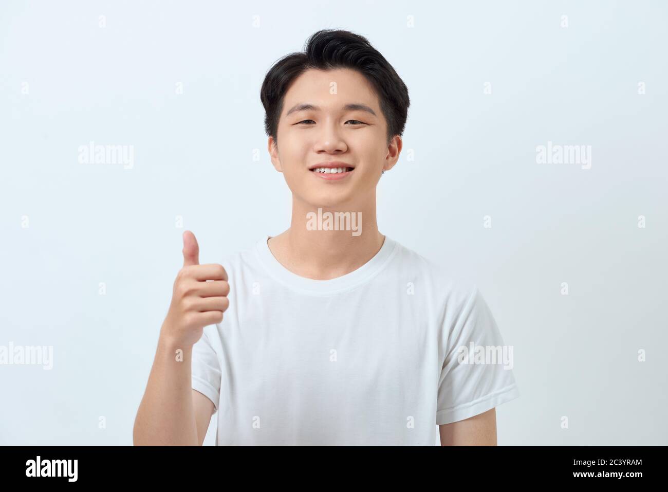 Good for you, face and thumb up sign Stock Photo - Alamy