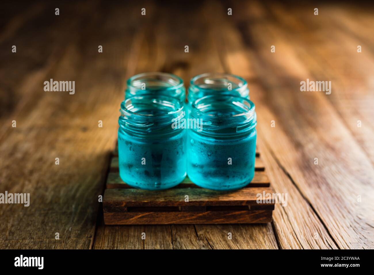 Blue colored alcoholic shooters hi-res stock photography and images - Alamy