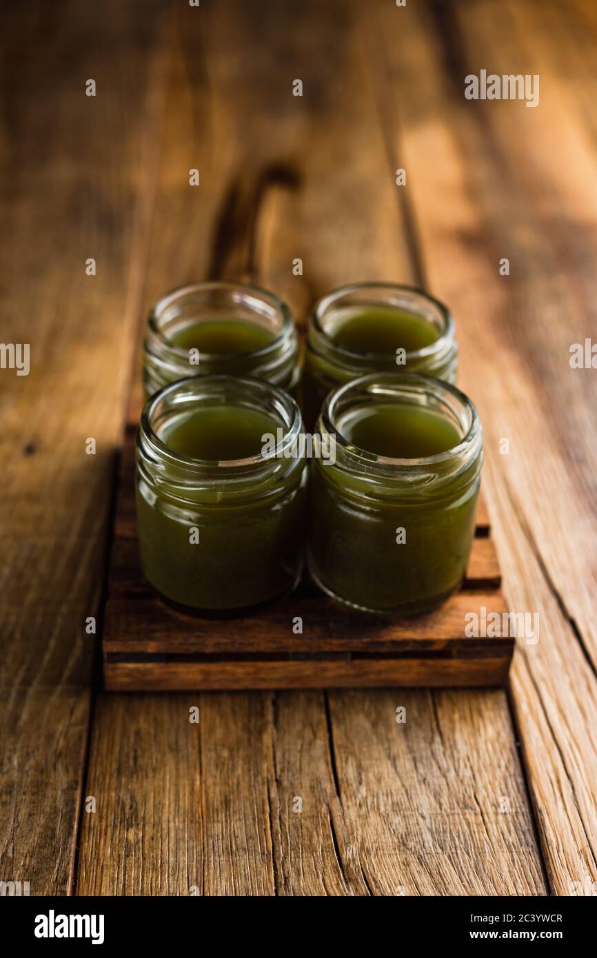 Green colored alcoholic shooters hi-res stock photography and images ...